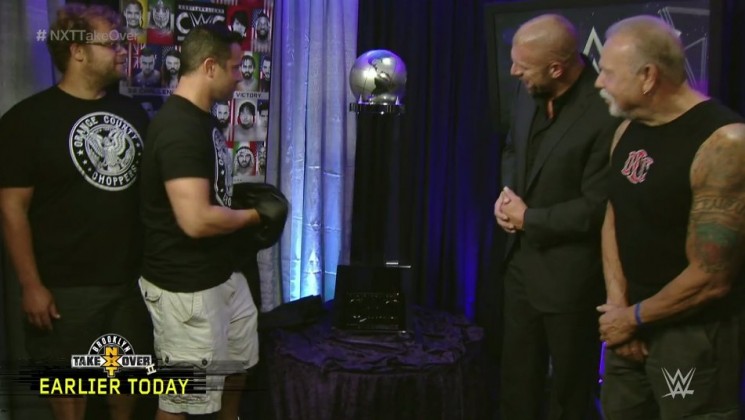 Triple H Unveils CWC Trophy - StillRealToUs.com